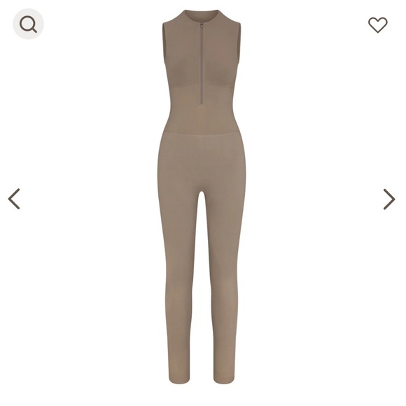 SKIMS | Pants & Jumpsuits | Skims Nylon Zip Front Catsuit In Truffle ...